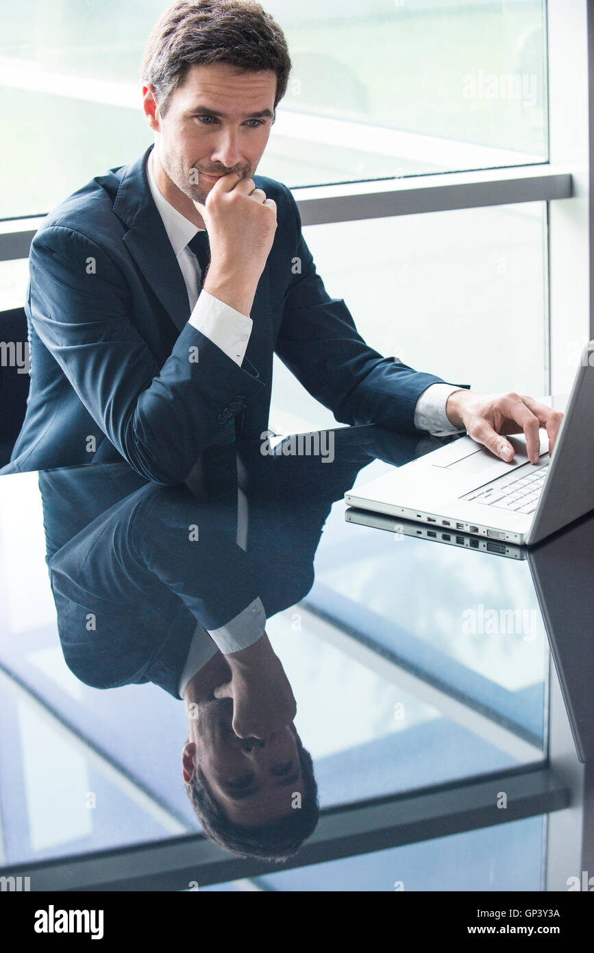 Focused businessman working laptop hand hi-res stock photography and ...