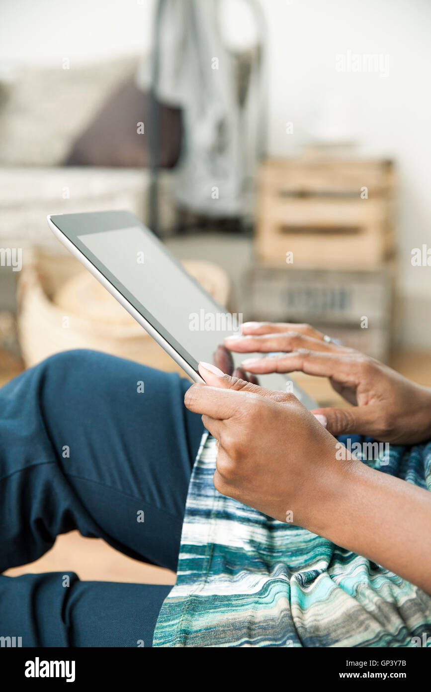 Using touch screen on digital tablet Stock Photo - Alamy