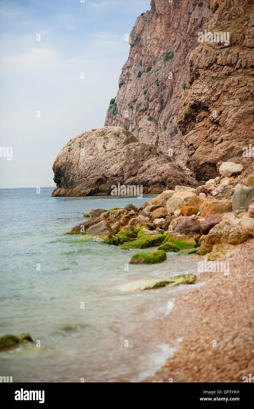 panoramic view of nice colorful huge cliff and sea on the back Stock ...