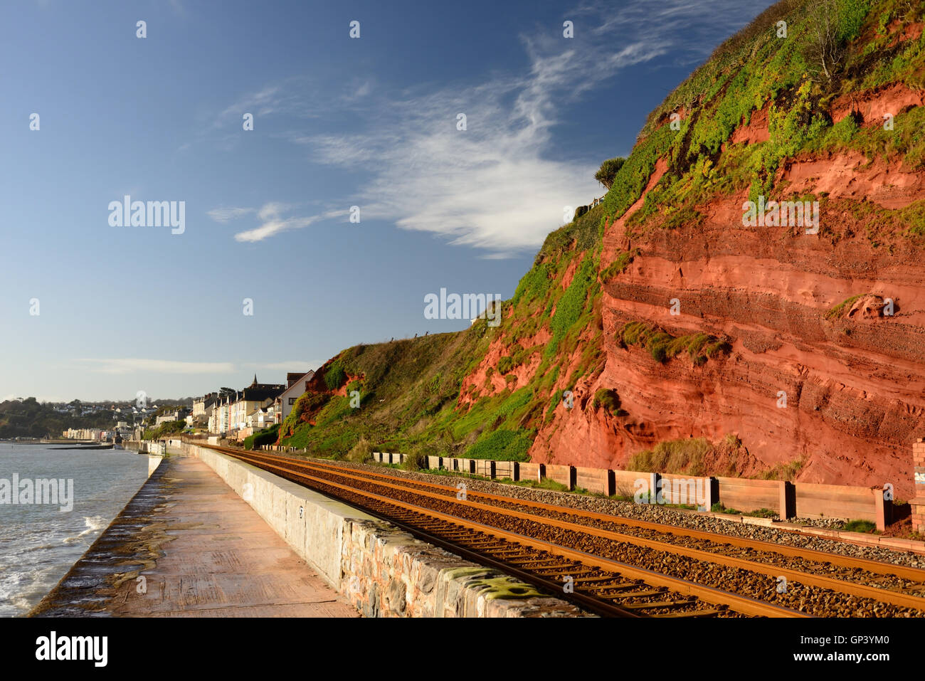 The railway line along Dawlish seafront, part of which was washed away ...