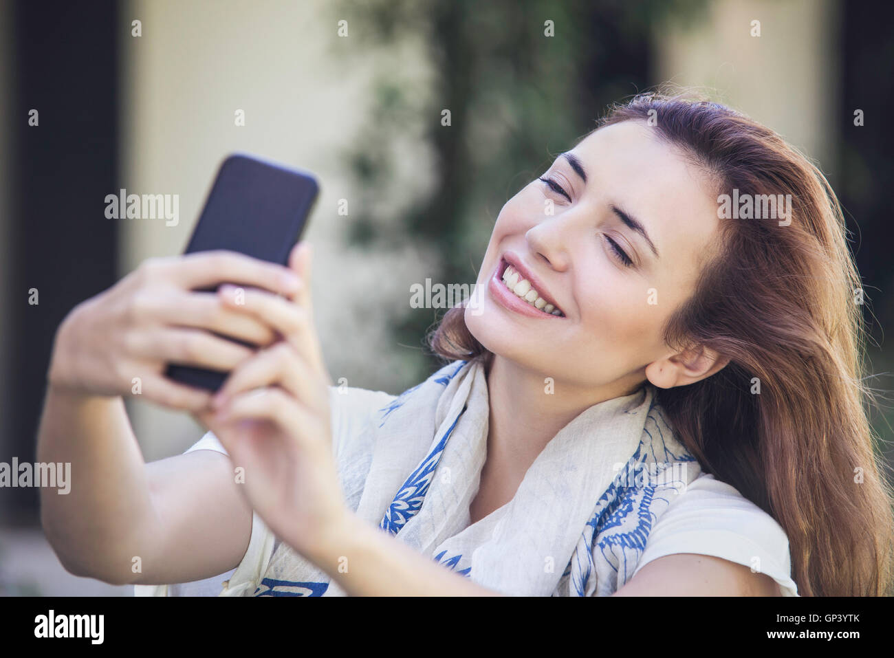 Woman taking selfie Stock Photo - Alamy