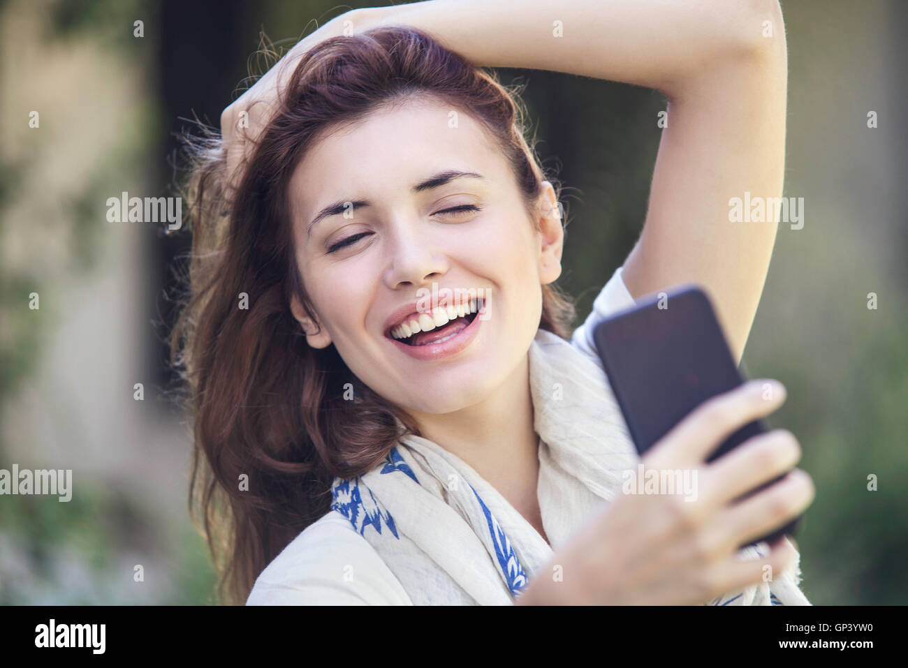 Woman taking selfie Stock Photo - Alamy