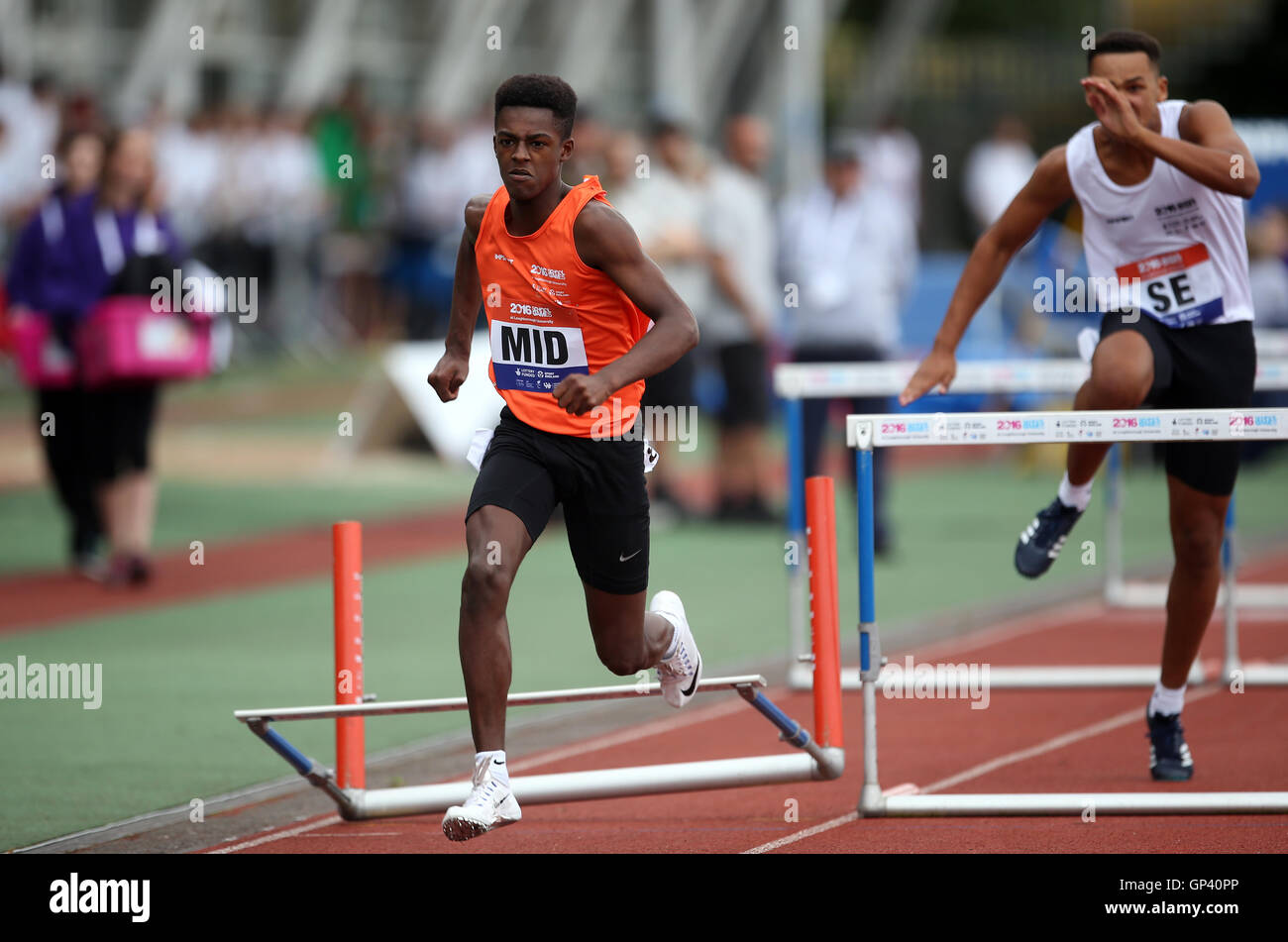 England Midland's Tre Thomas wins the boys 100m hurdles during the ...