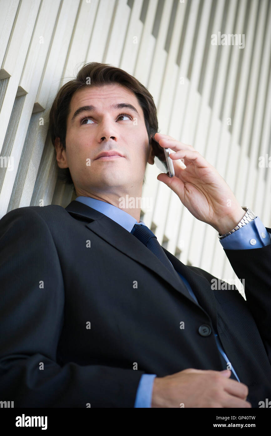 Businessman using cell phone Stock Photo - Alamy