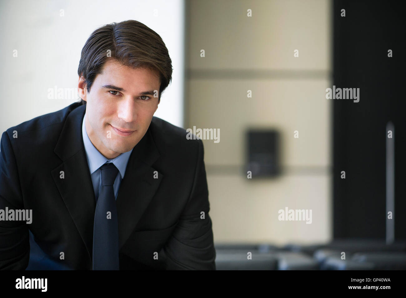 Businessman smiling, portrait Stock Photo - Alamy