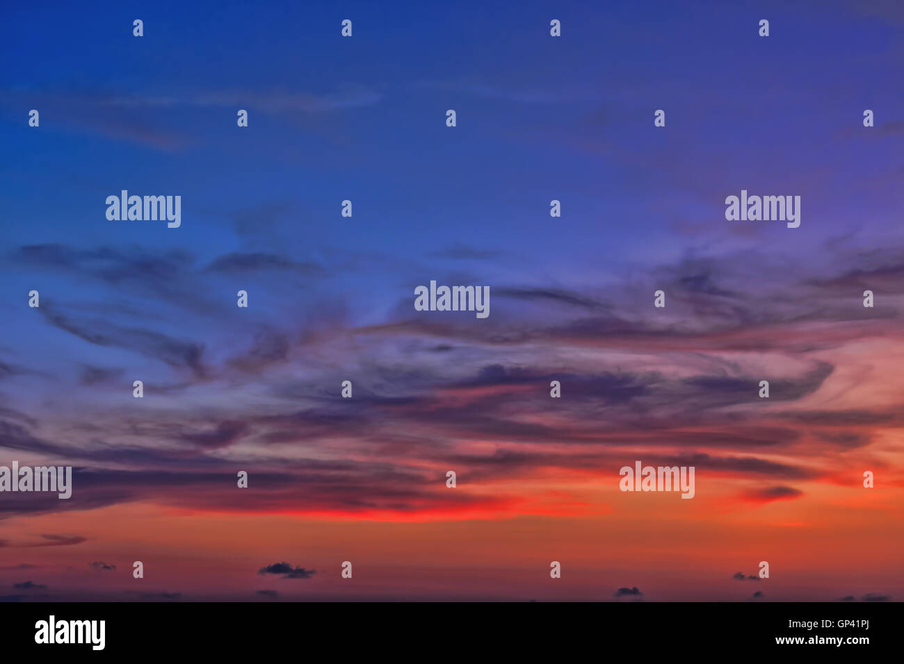 Cloudy skies colorful background pattern Stock Photo - Alamy