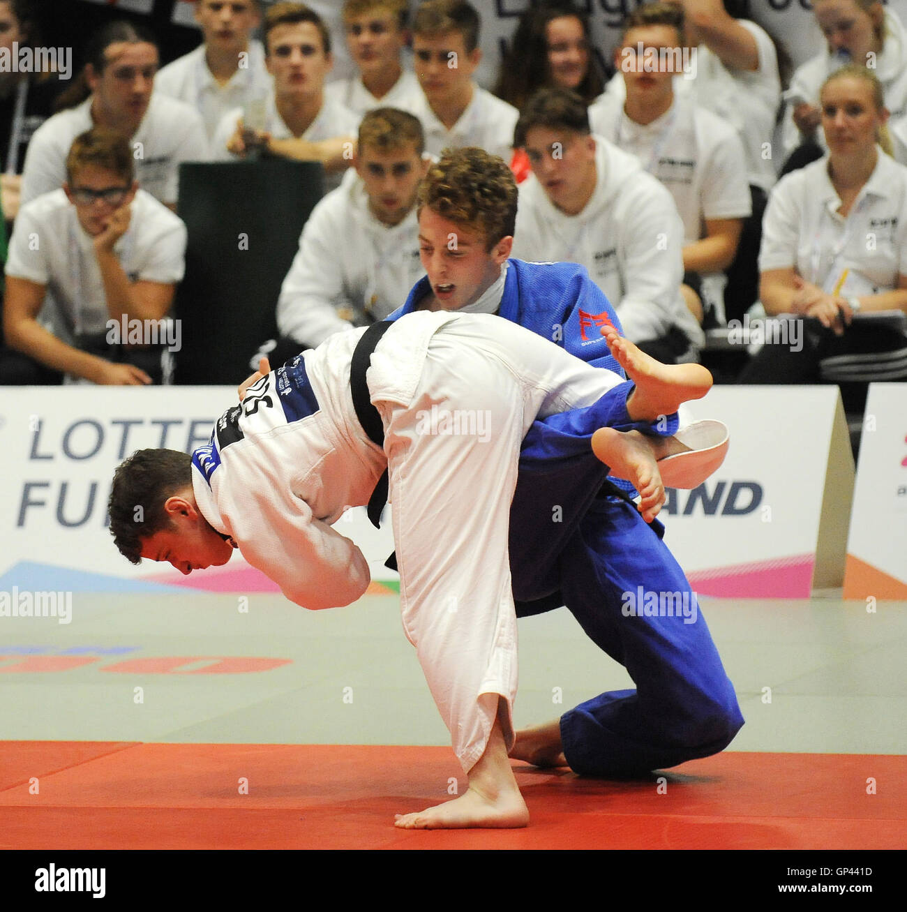 England's Jamie Halliday (right) and Scotland's Morgan McDonald compete ...