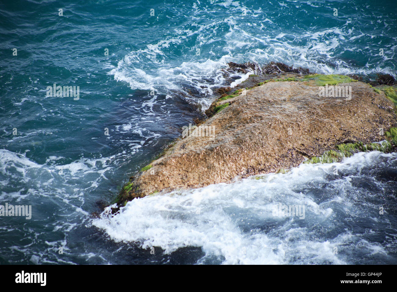 Stone In The Sea Stock Photo - Alamy