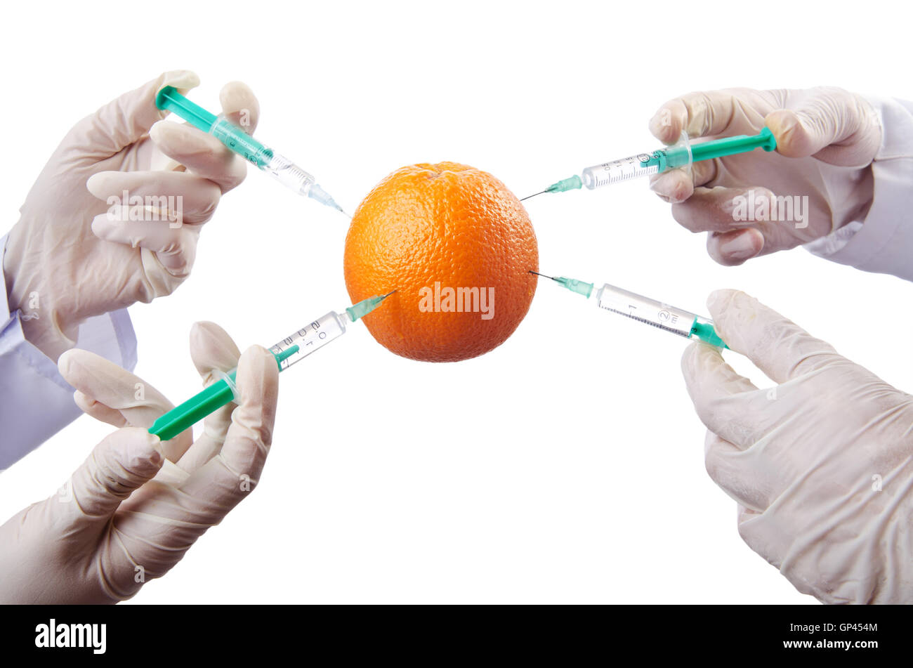 Science experiment with orange and syringe Stock Photo - Alamy