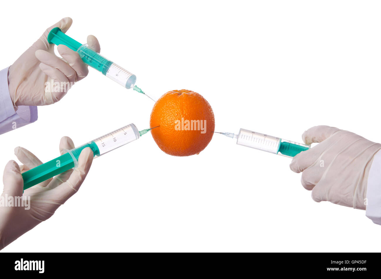 Science experiment with orange and syringe Stock Photo - Alamy