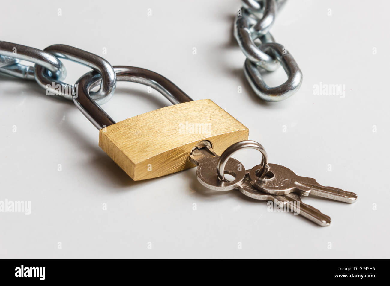 Brass padlock metal chain hi-res stock photography and images - Alamy