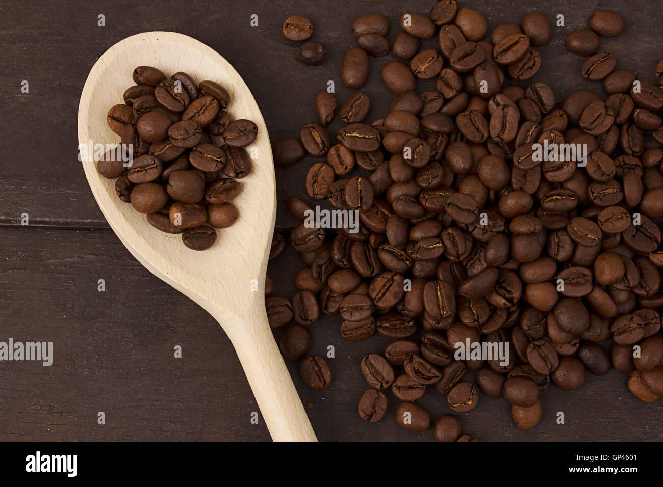 Collection of organic coffee grains on rustic background Stock Photo ...