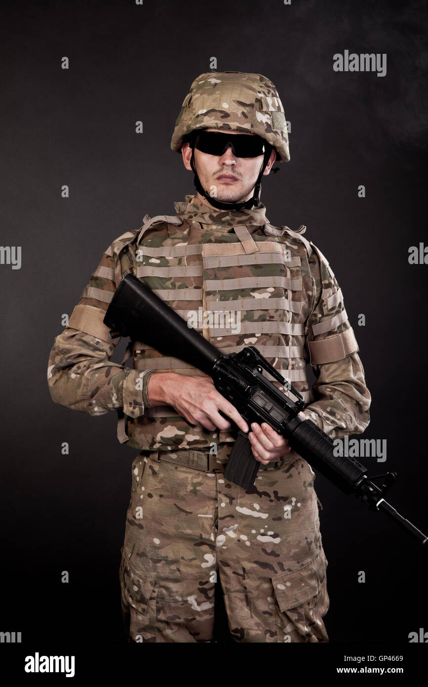 Modern soldier with rifle Stock Photo - Alamy