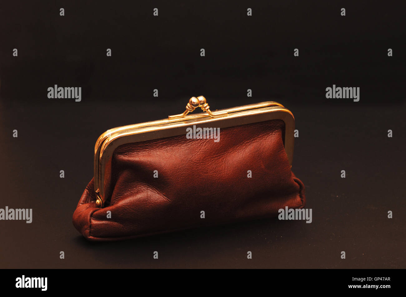 Empty vintage purse Stock Photo - Alamy