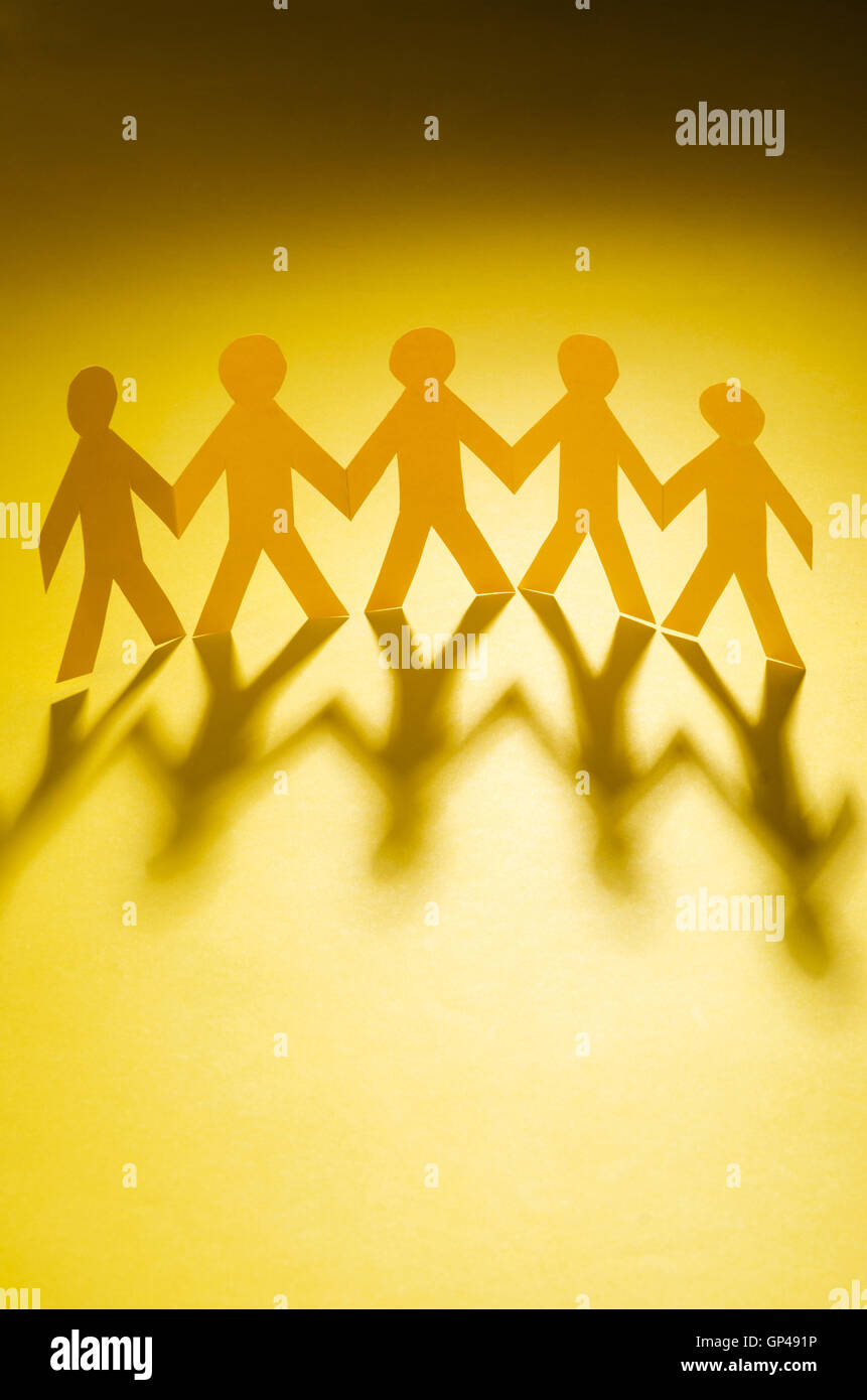 Paper people in teamworking concept Stock Photo - Alamy