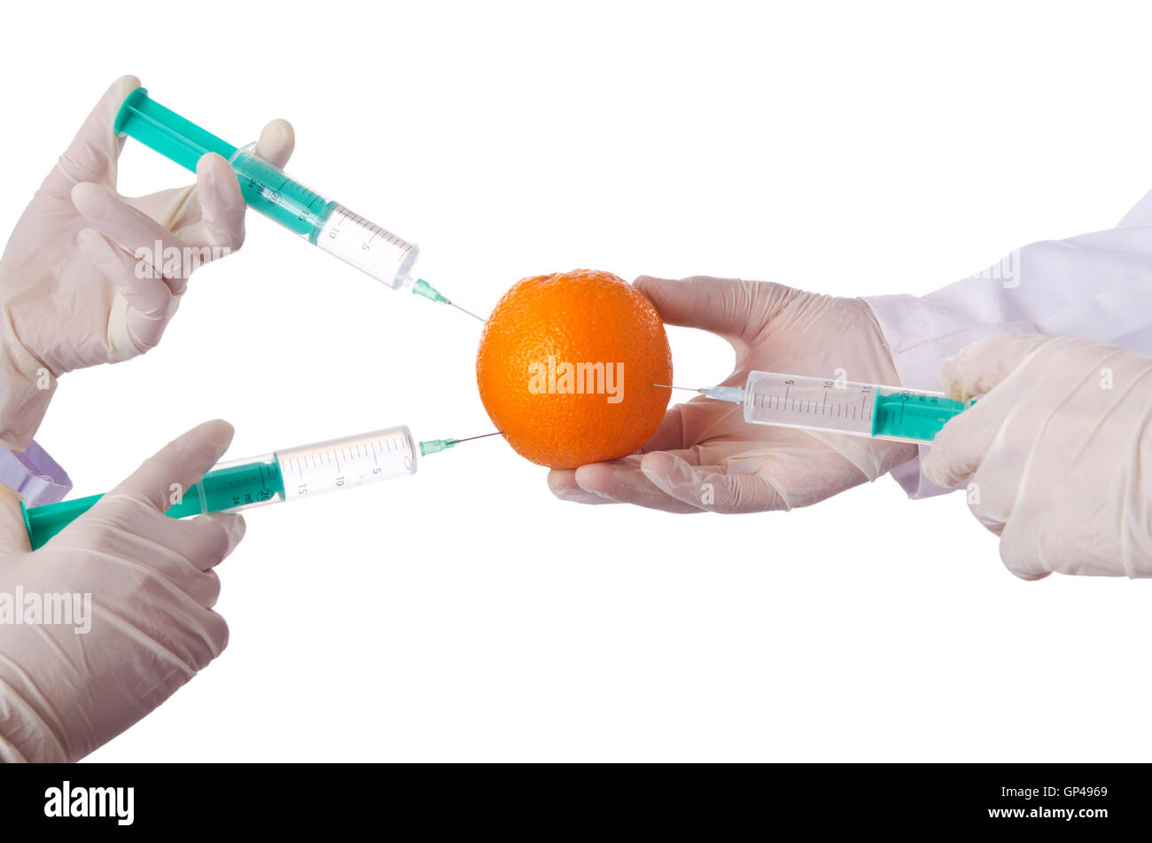 Science experiment with orange and syringe Stock Photo - Alamy