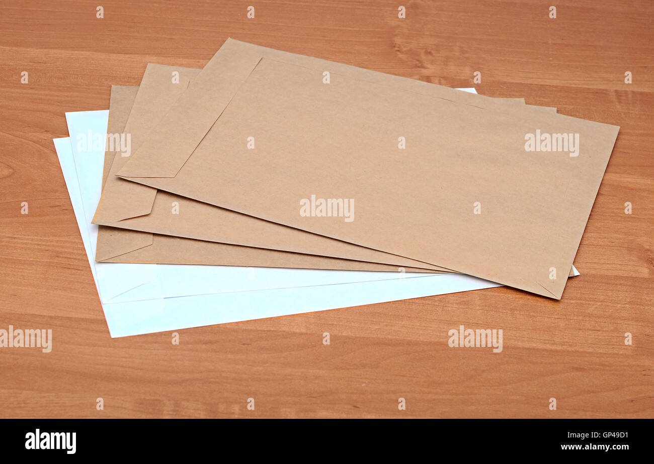 brown envelopes on table Stock Photo - Alamy
