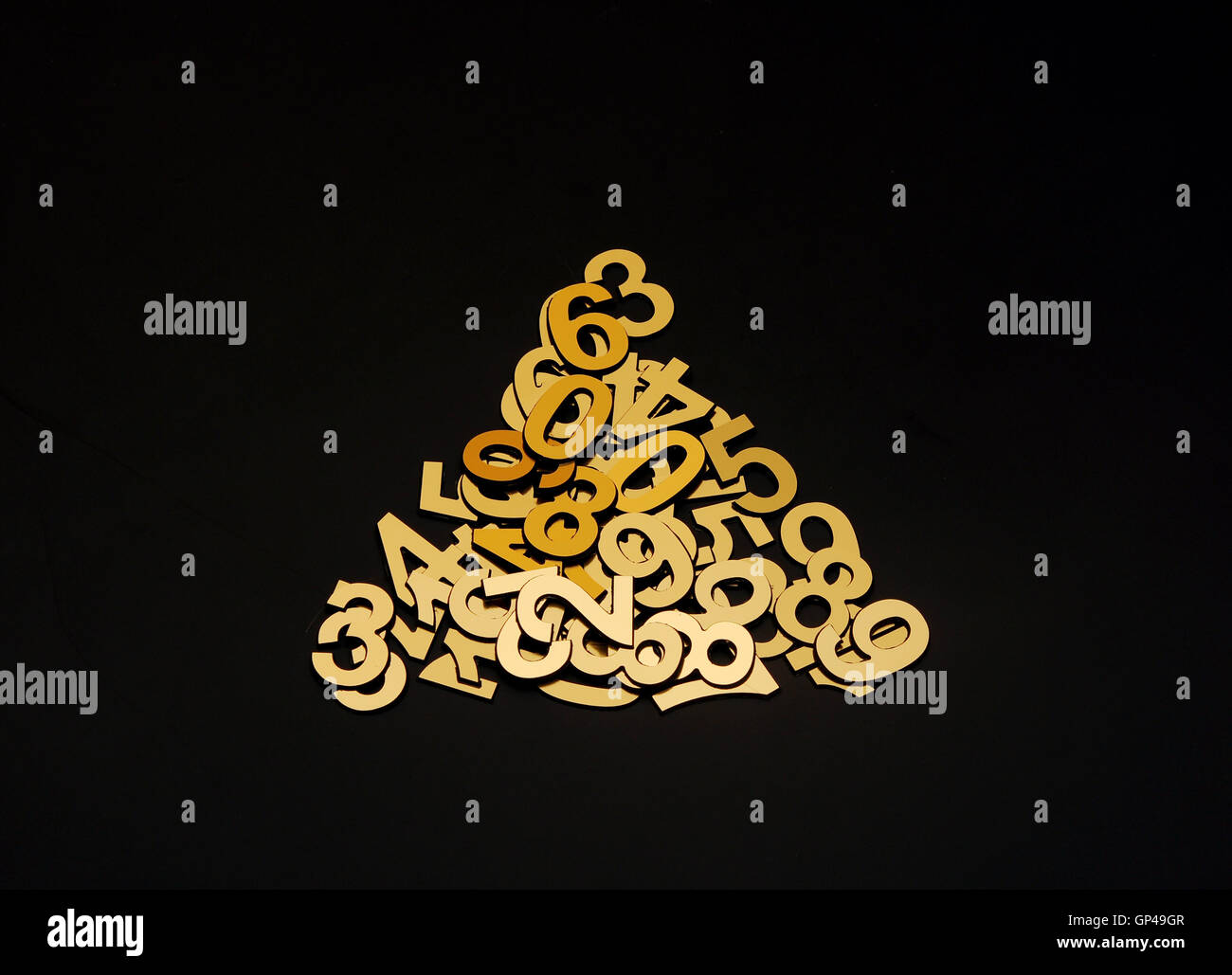 pyramid of random numbers on black background Stock Photo - Alamy