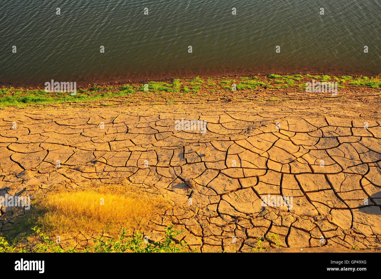 Arid land and lake Stock Photo - Alamy
