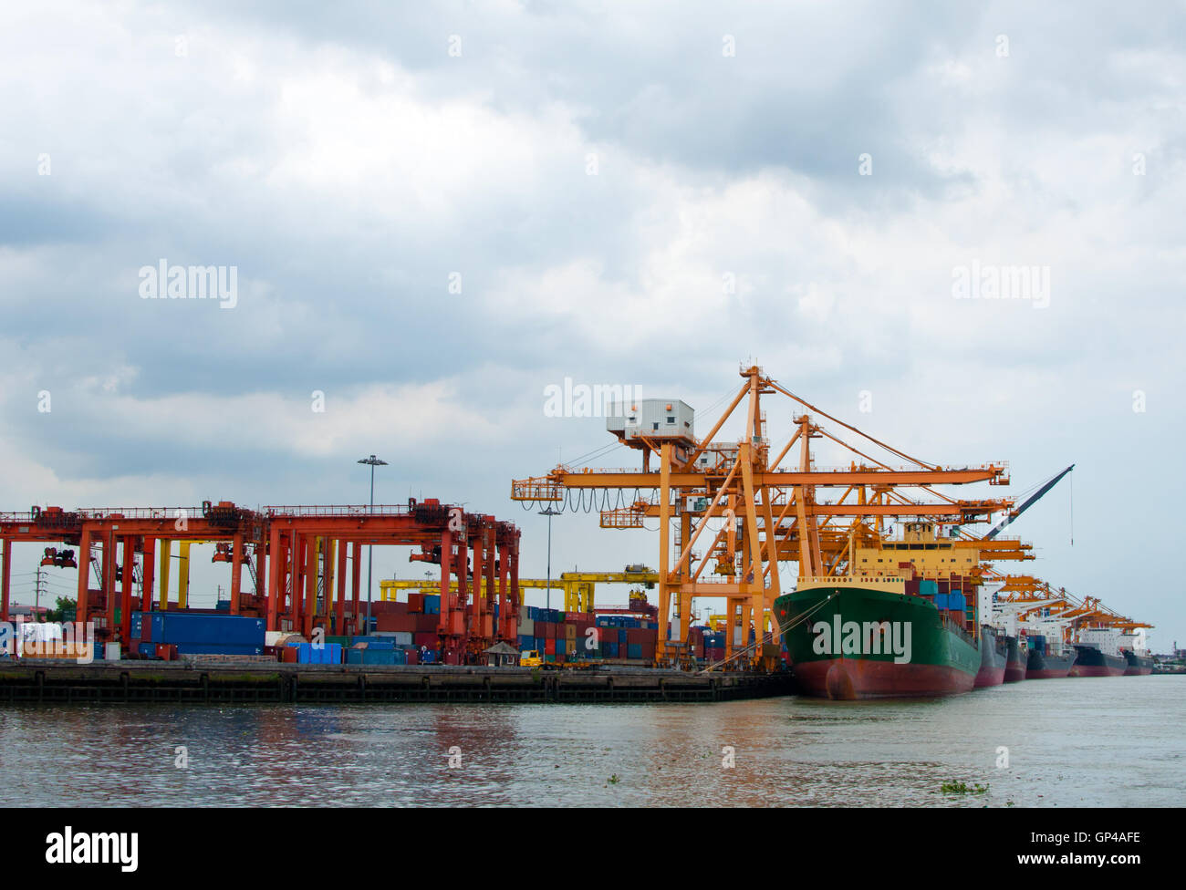 Industrial Container Cargo freight ship with working crane Stock Photo ...