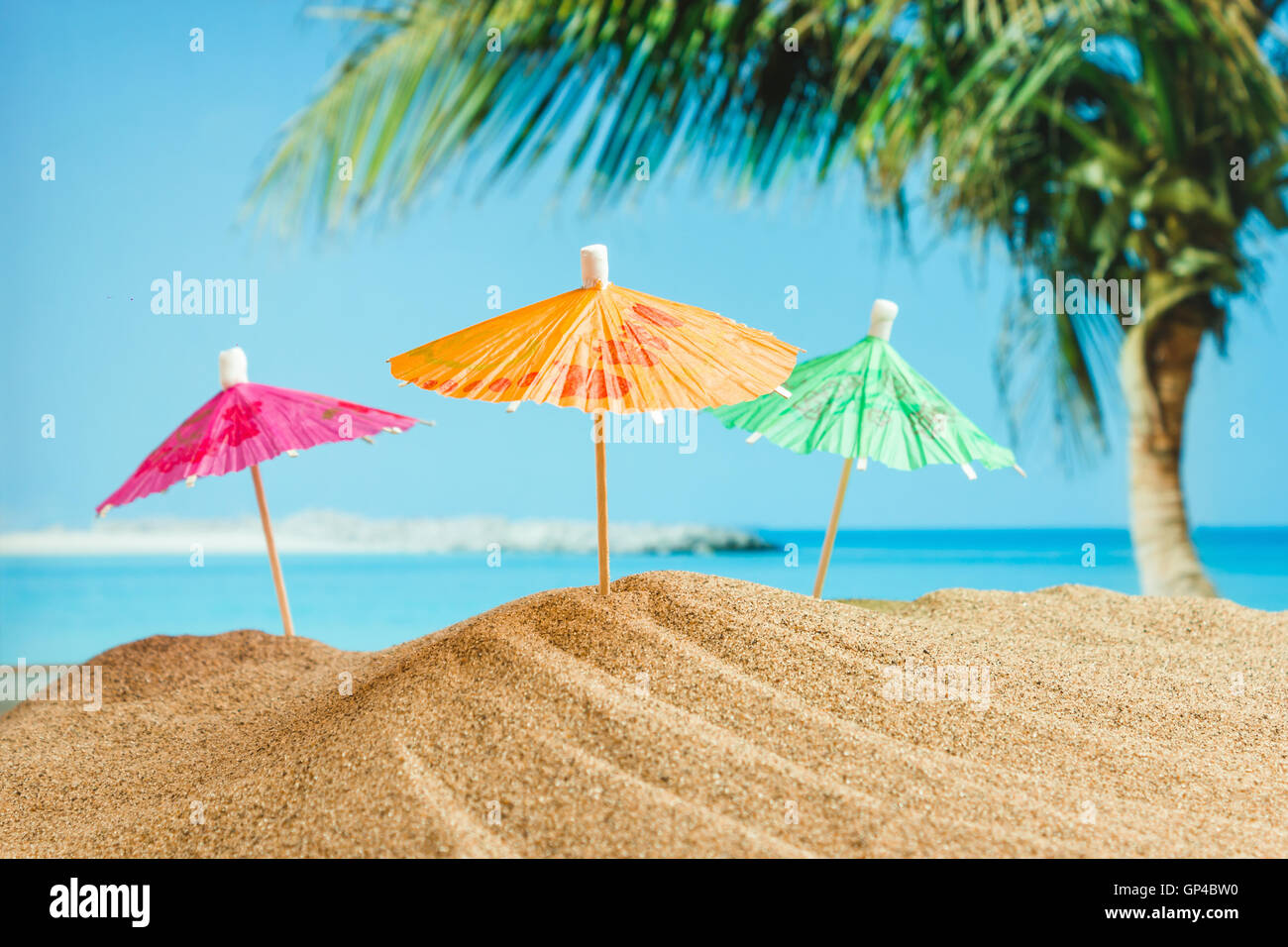Umbrella on the sand Stock Photo - Alamy