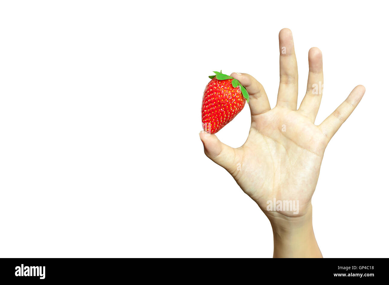 Strawberry hand. Organic food strawberry in the woman's hand isolated ...