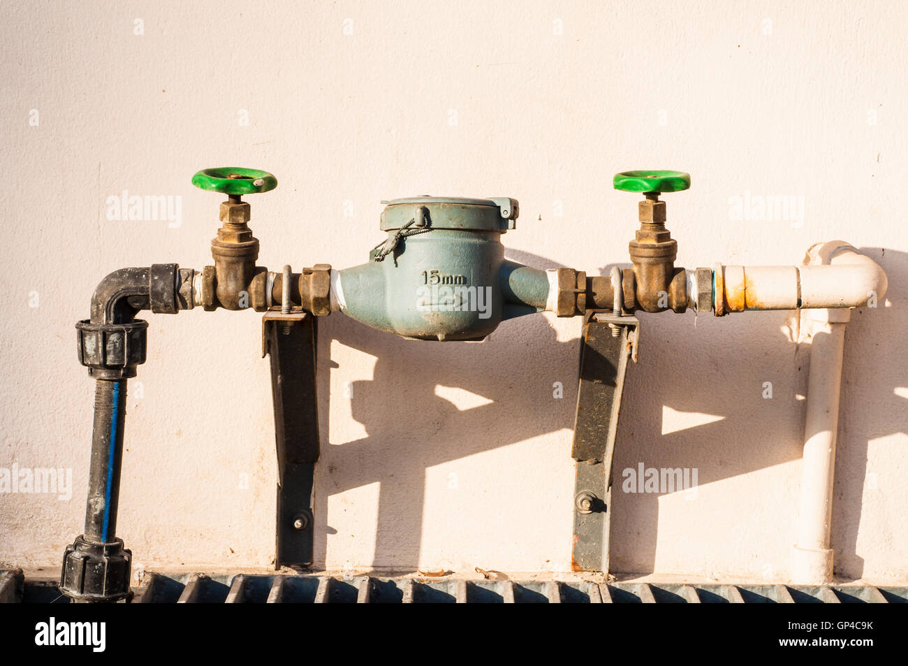 old rusty water pipe, meter and valve Stock Photo - Alamy