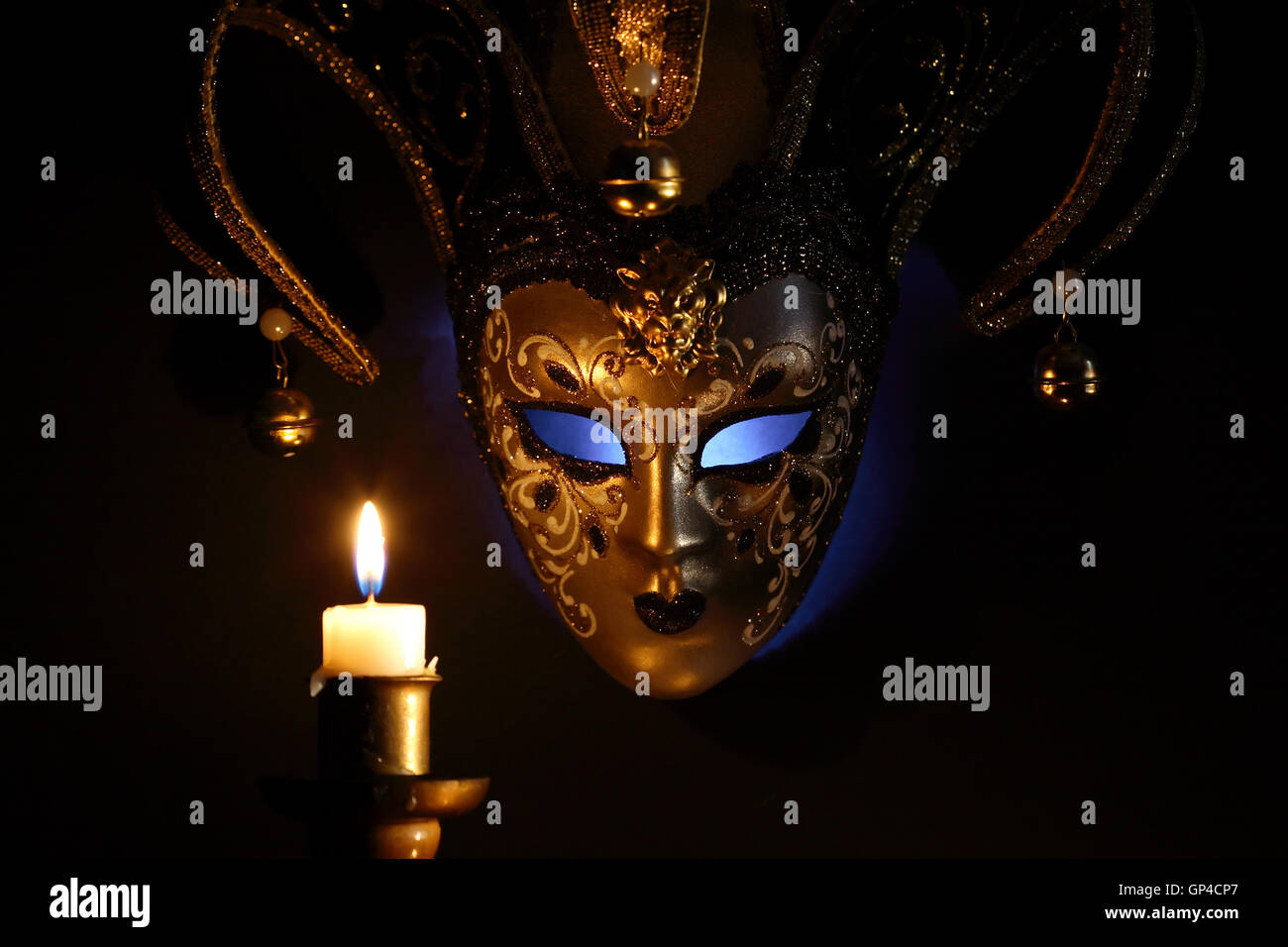 Mask And Candle Stock Photo - Alamy