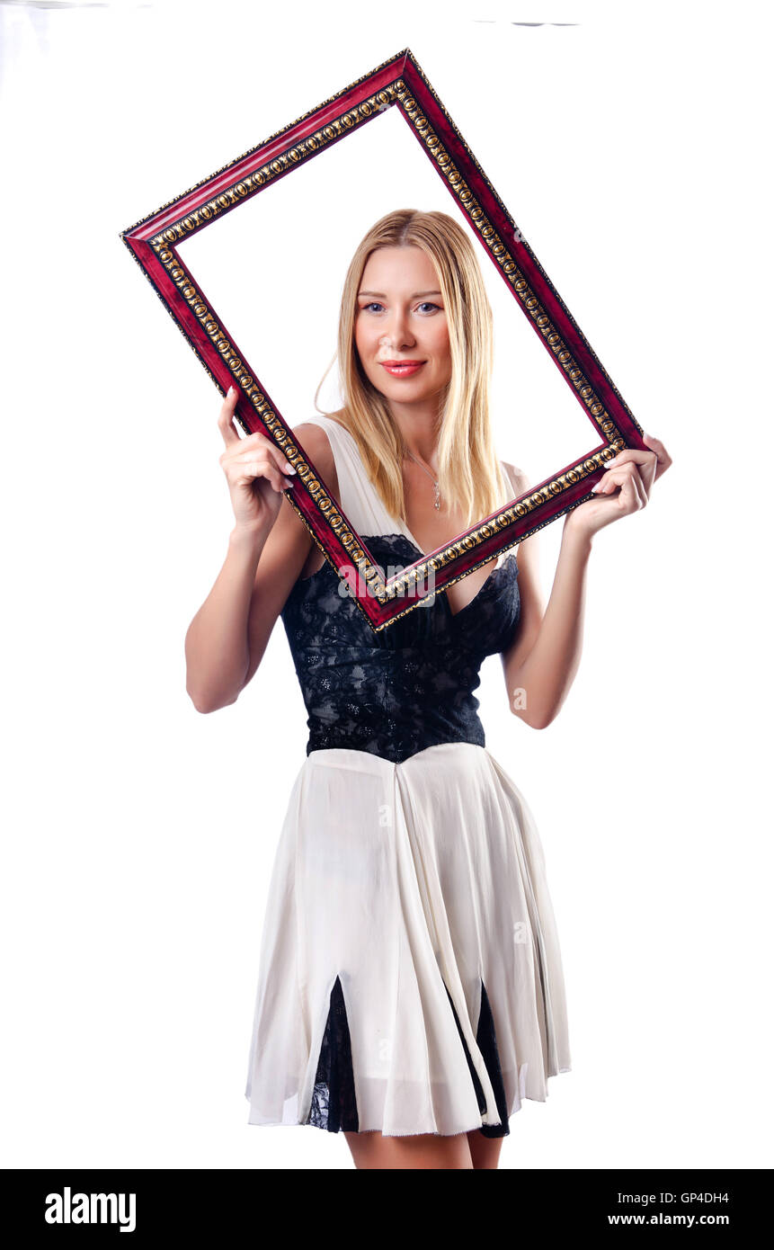 Young woman with picture frame on white Stock Photo - Alamy