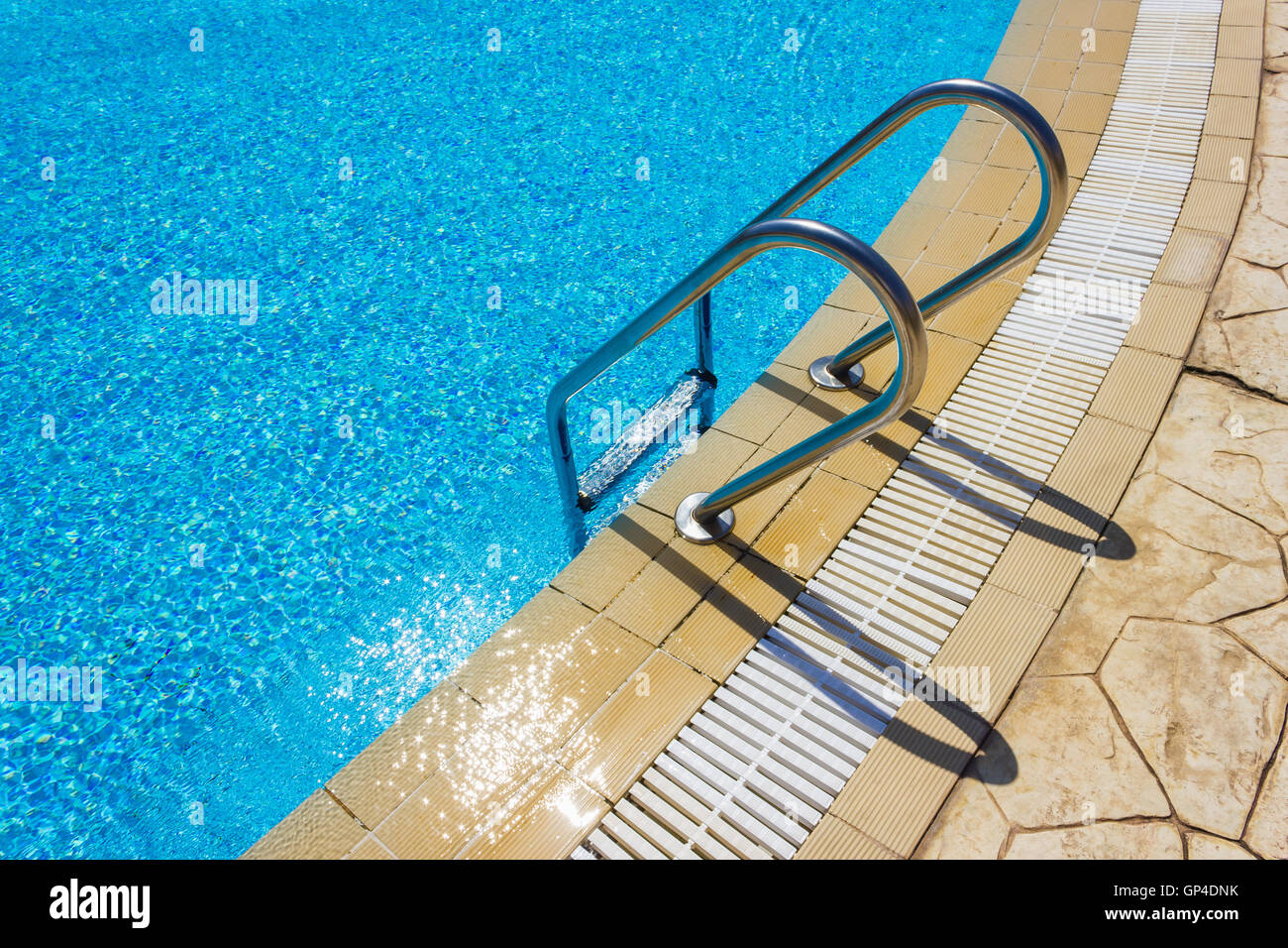 Grab bars ladder in the swimming pool Stock Photo - Alamy