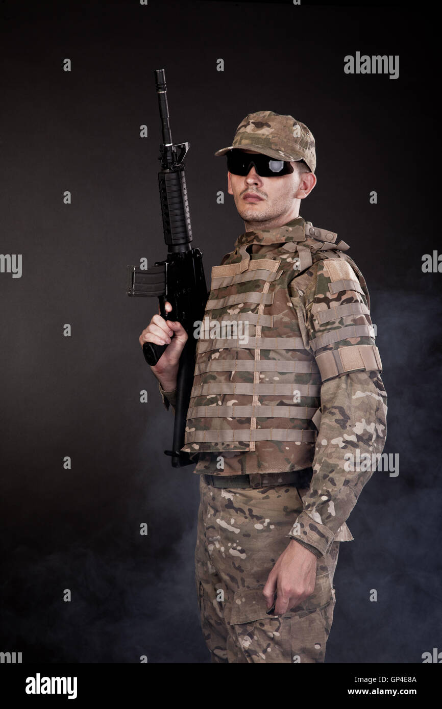 Modern soldier with rifle Stock Photo - Alamy