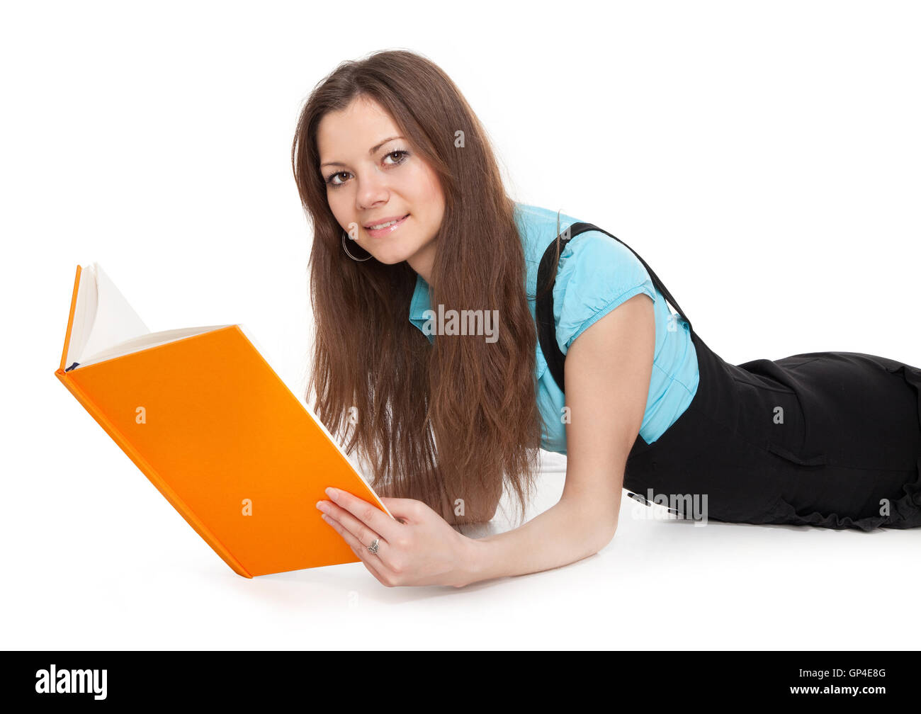 Beautiful student is reading a book Stock Photo - Alamy