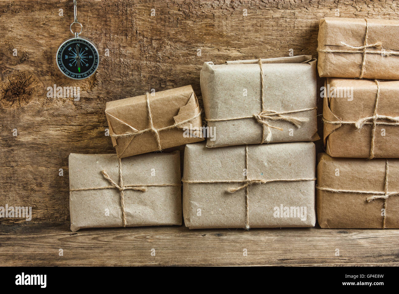 Postage on the background of an old board Stock Photo - Alamy