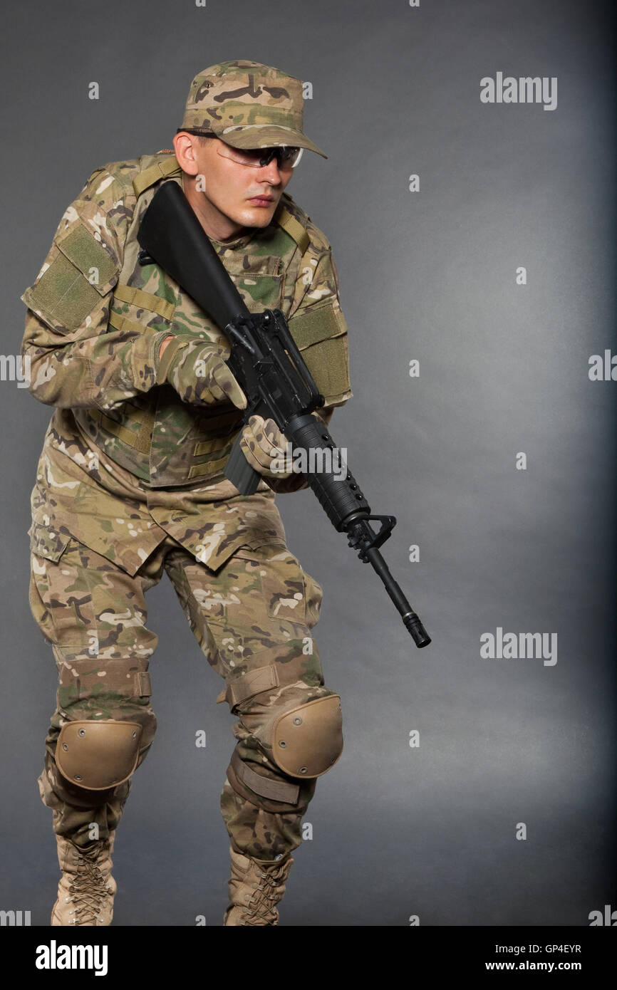 Soldier with rifle Stock Photo - Alamy