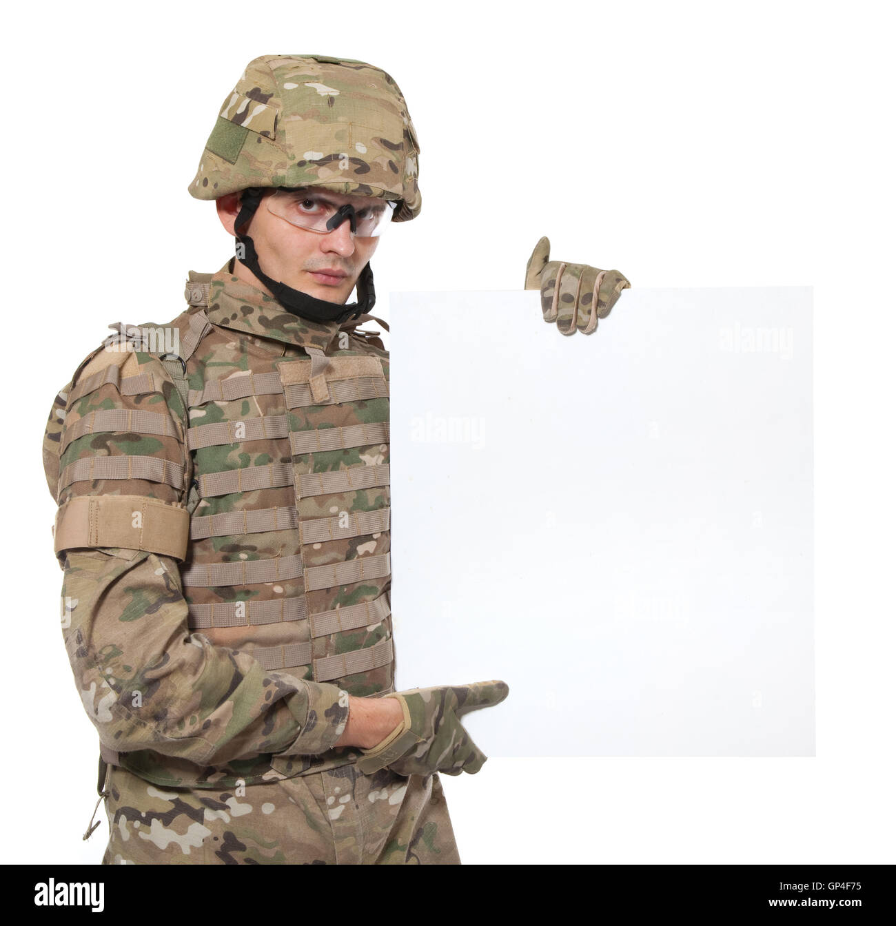 Modern soldier holding a poster Stock Photo - Alamy