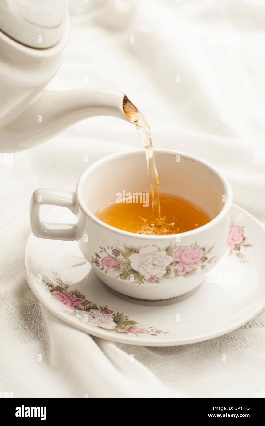 Tea being poured isolated hi-res stock photography and images - Alamy