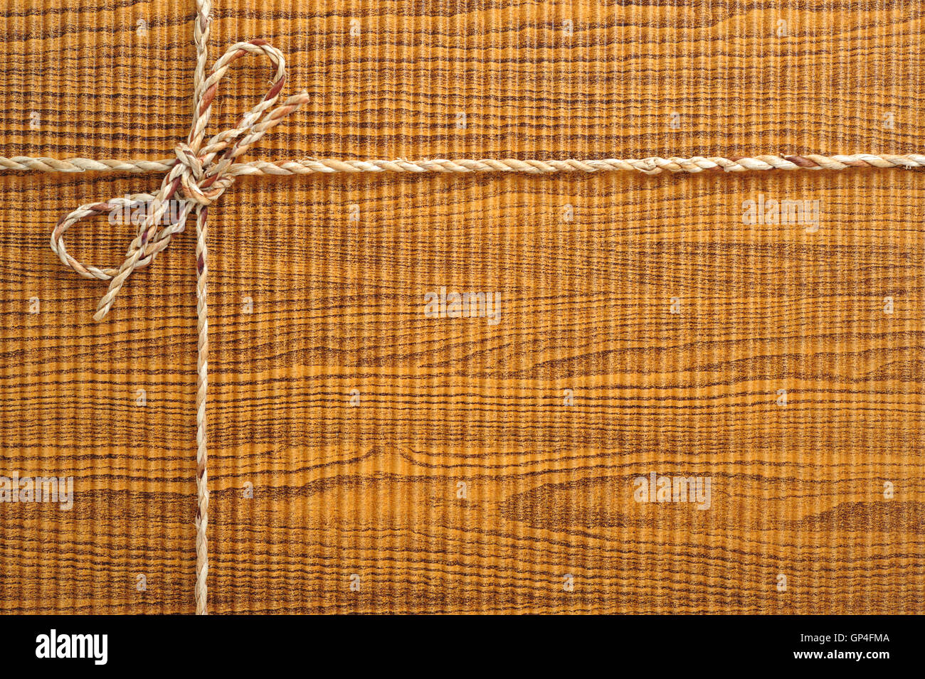 Brown cardboard box with string Stock Photo - Alamy