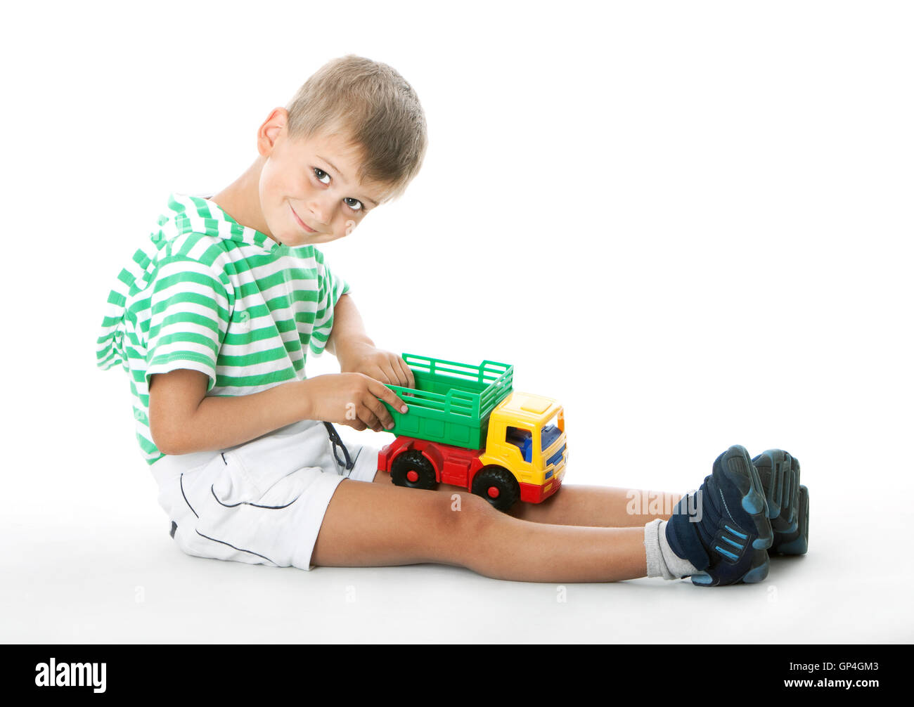 Boy with a toy Stock Photo - Alamy
