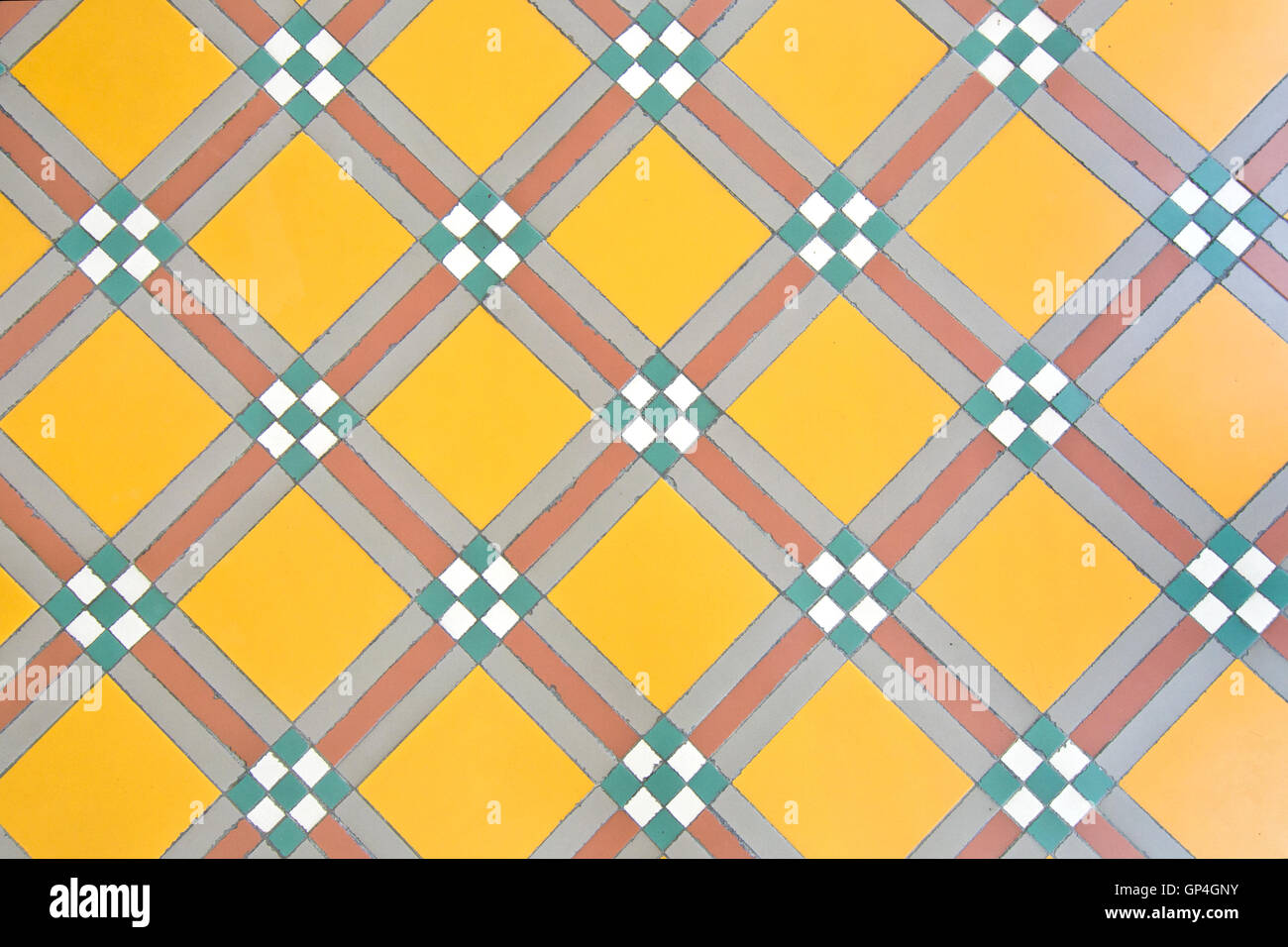 Vintage yellow floor tile Stock Photo - Alamy