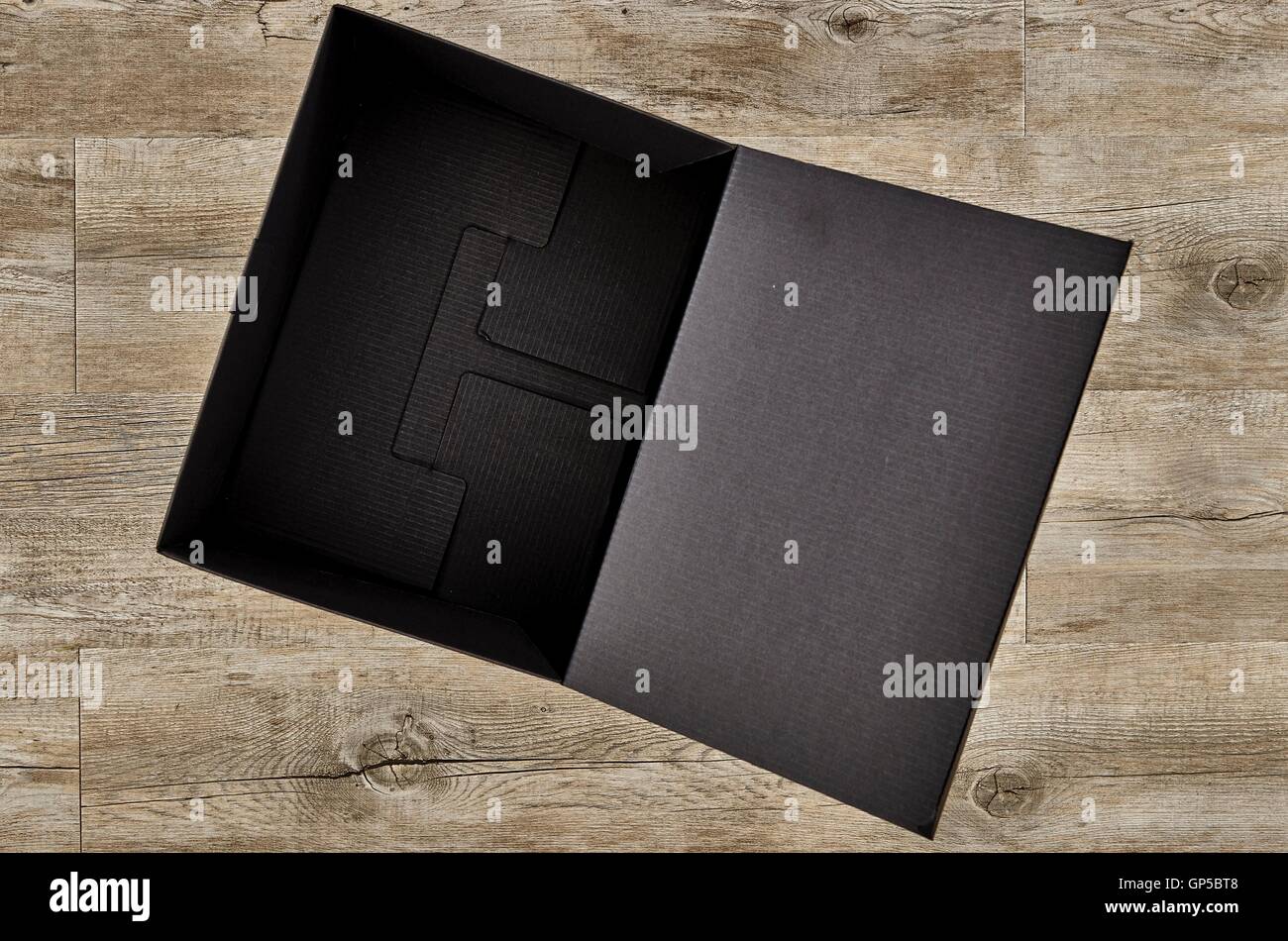 A studio photo of a black box Stock Photo - Alamy