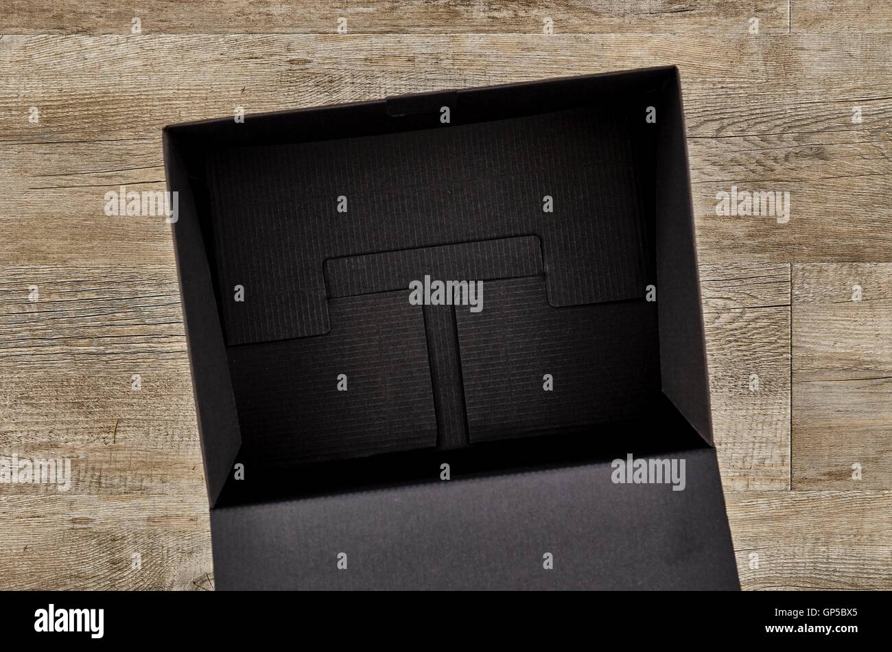 A studio photo of a black box Stock Photo - Alamy