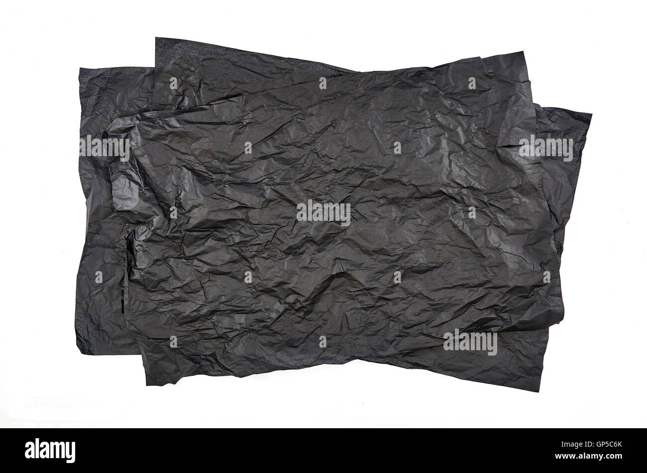 A studio photo of black wrapping paper Stock Photo - Alamy