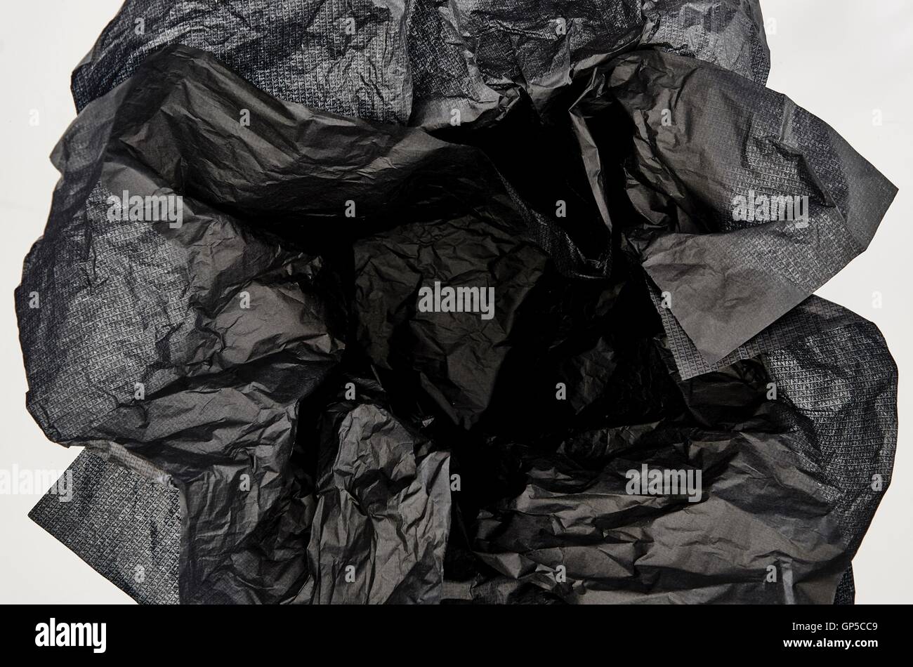 A studio photo of black wrapping paper Stock Photo - Alamy