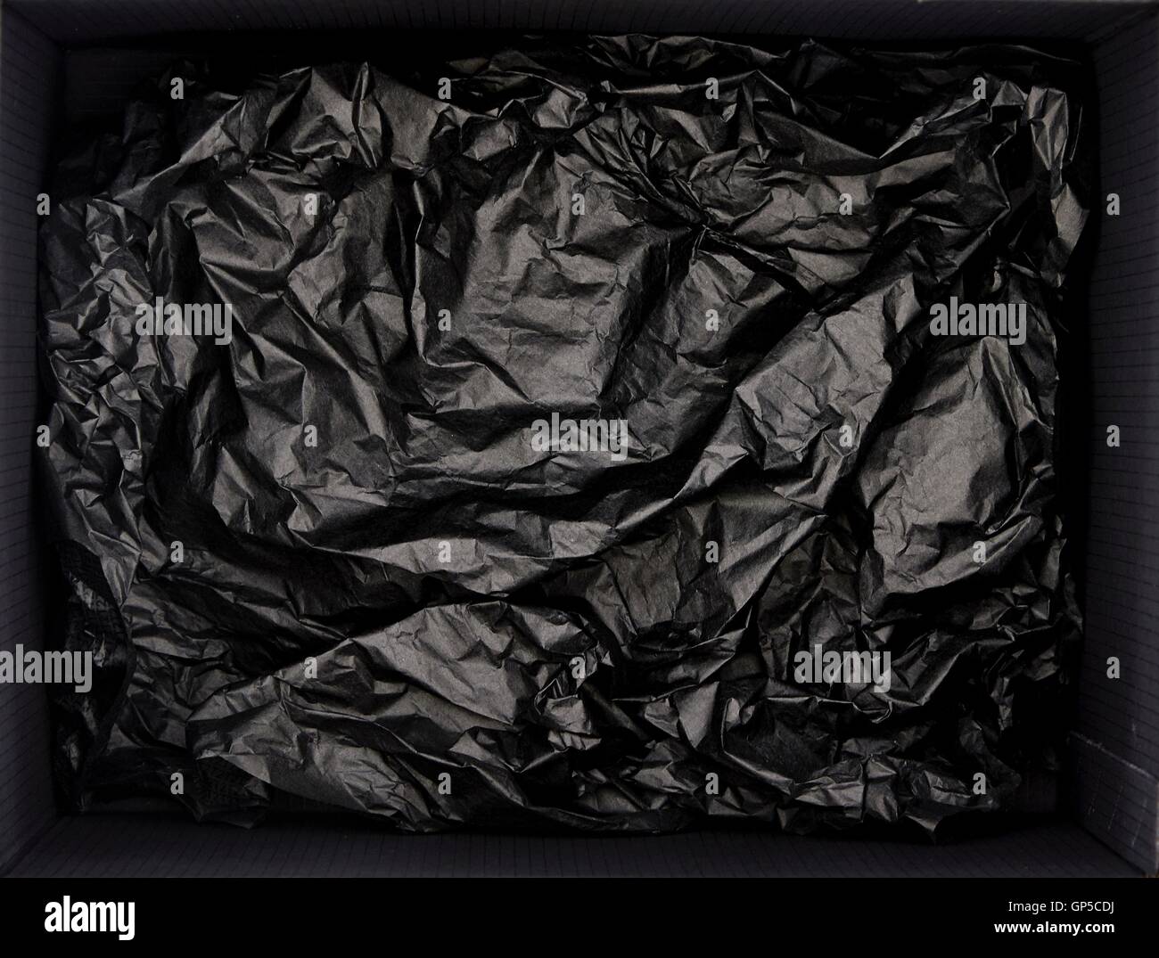 A studio photo of a black box Stock Photo - Alamy