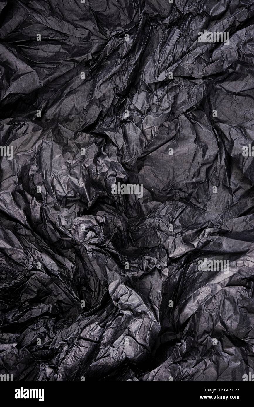 A studio photo of black wrapping paper Stock Photo - Alamy