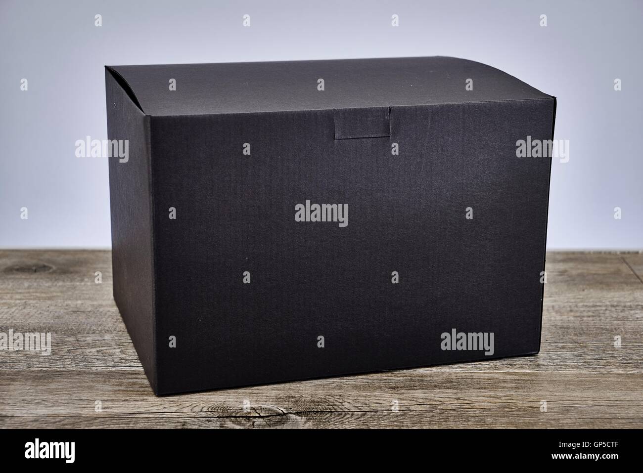 A studio photo of a black box Stock Photo - Alamy