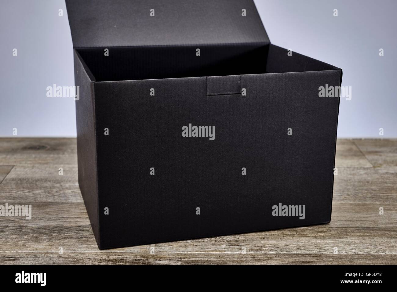 A studio photo of a black box Stock Photo - Alamy