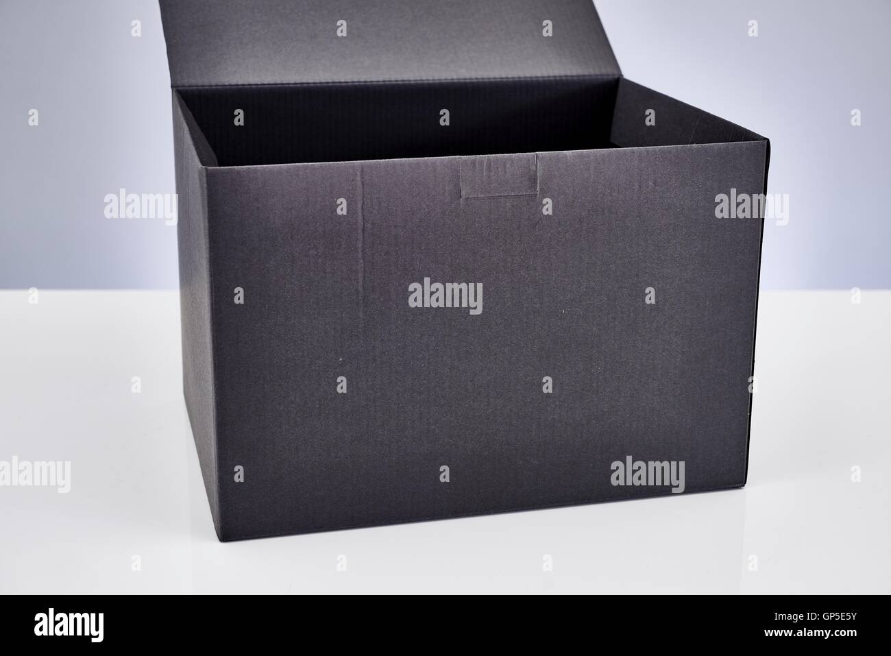 A studio photo of a black box Stock Photo - Alamy