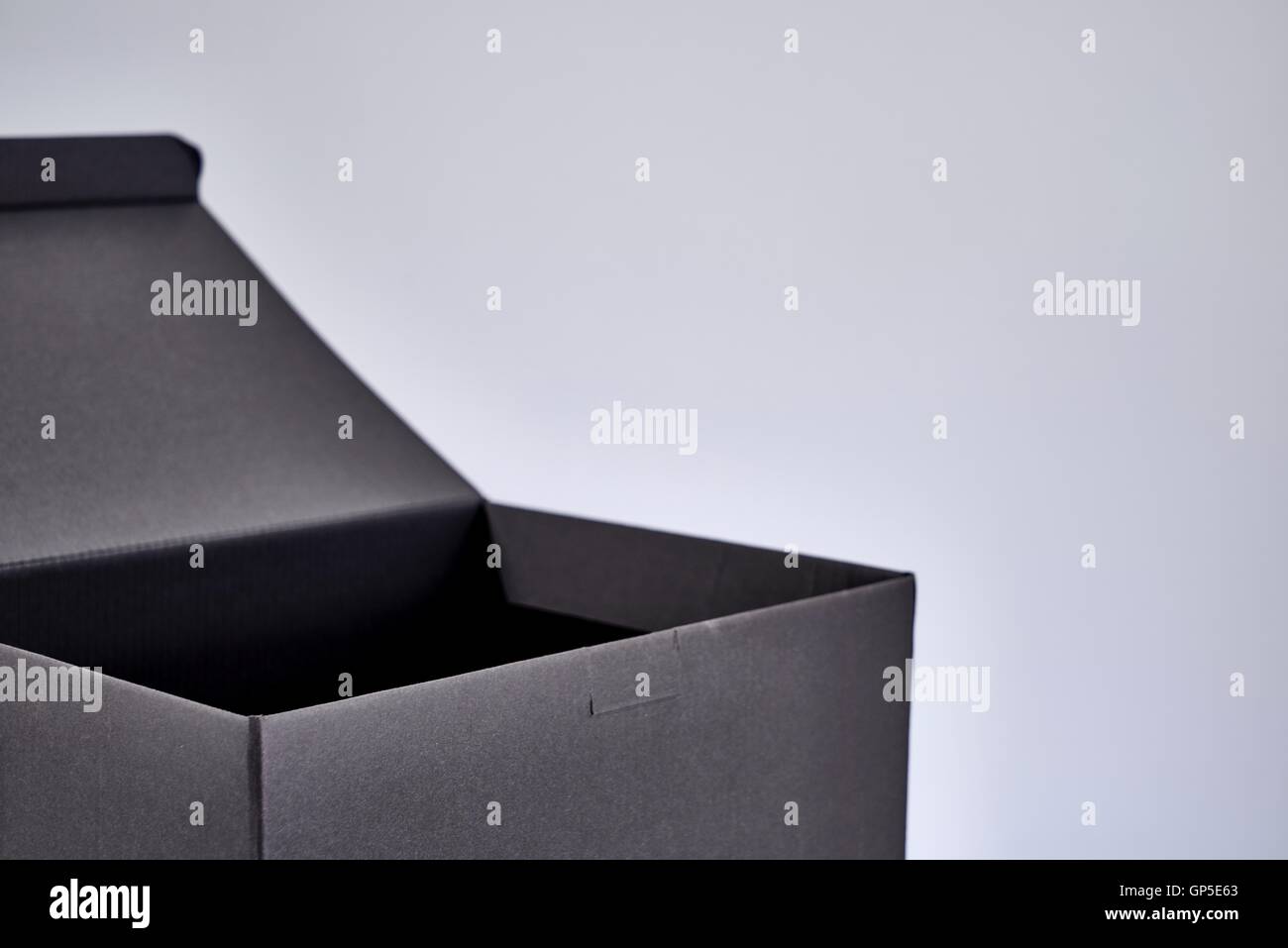A studio photo of a black box Stock Photo - Alamy
