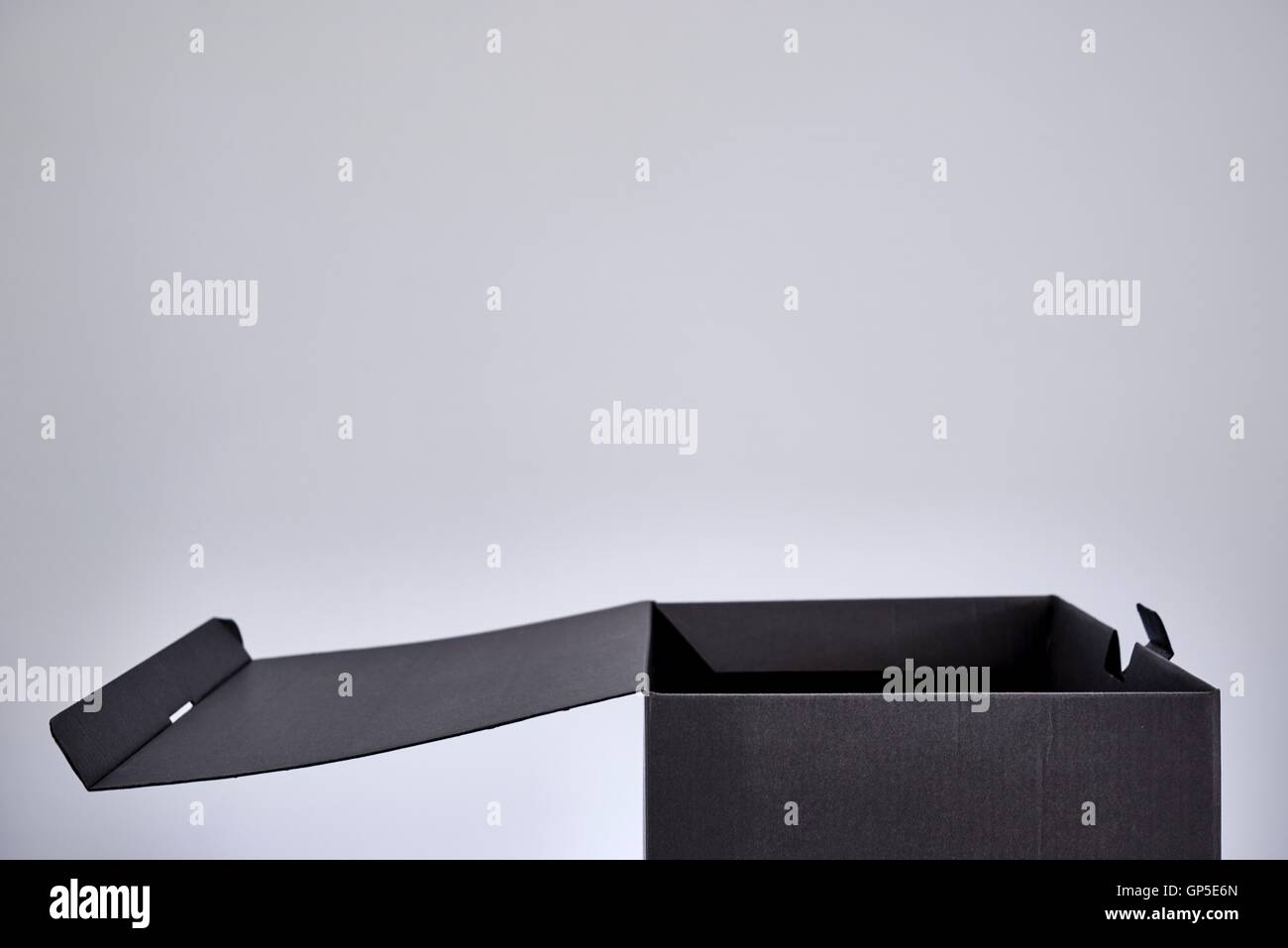 A studio photo of a black box Stock Photo - Alamy